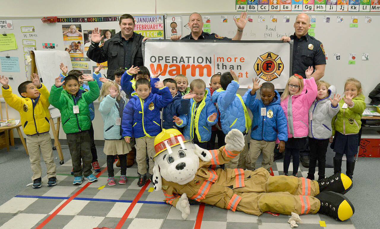 SKFR firefighters present young Mirror Lake students with coats for ...