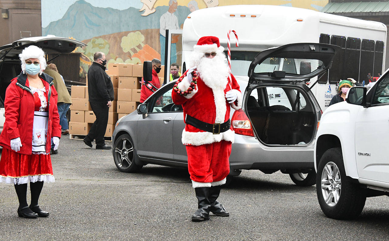 Santa Parade collects 3,000 pounds of canned food donations for local ...